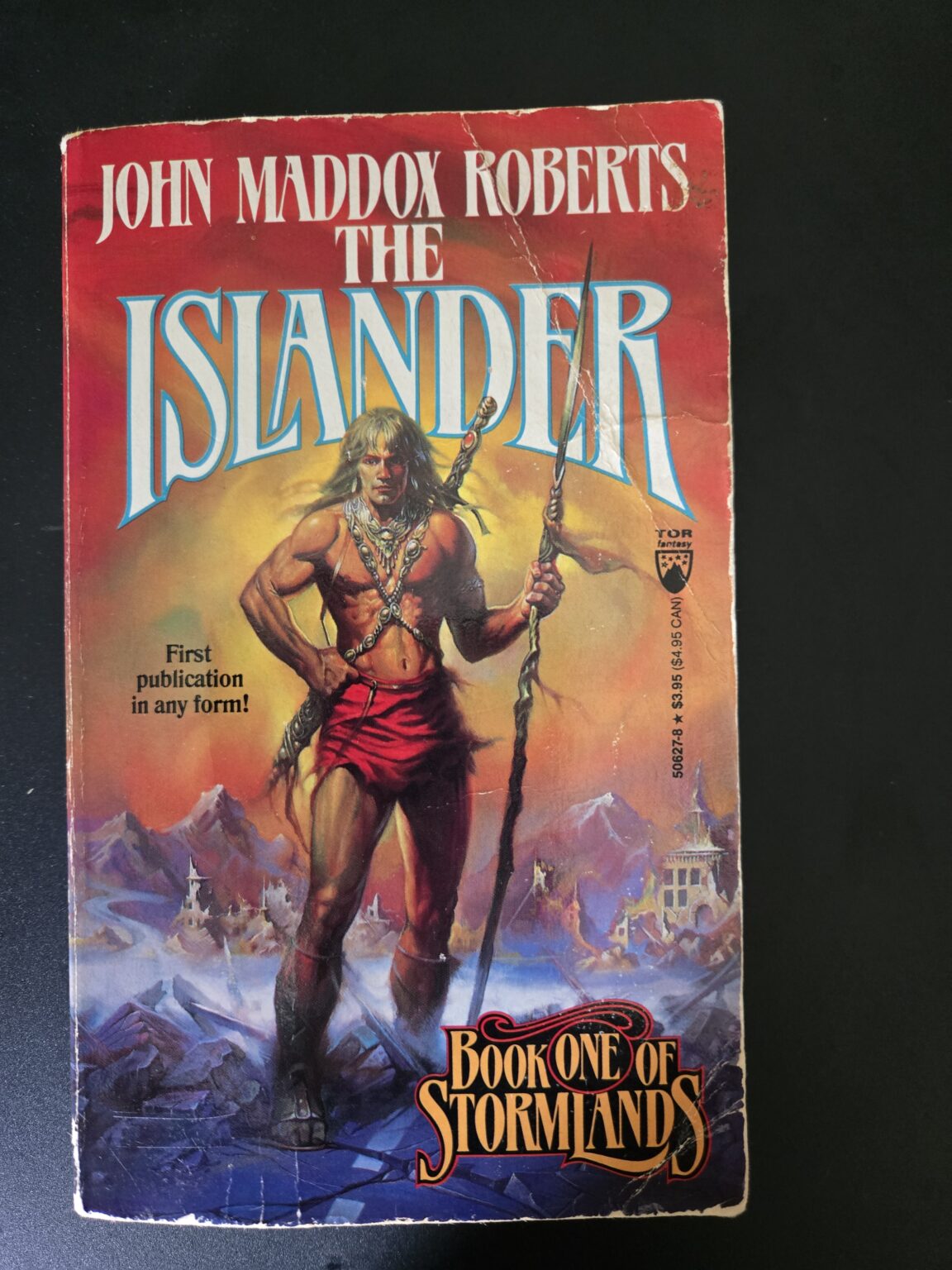 John Maddox Roberts’ “The Islander.” – Ken Lizzi